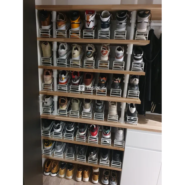 Een zelfgemaakte gangkast afgewerkt met op maat gezaagd eiken ...