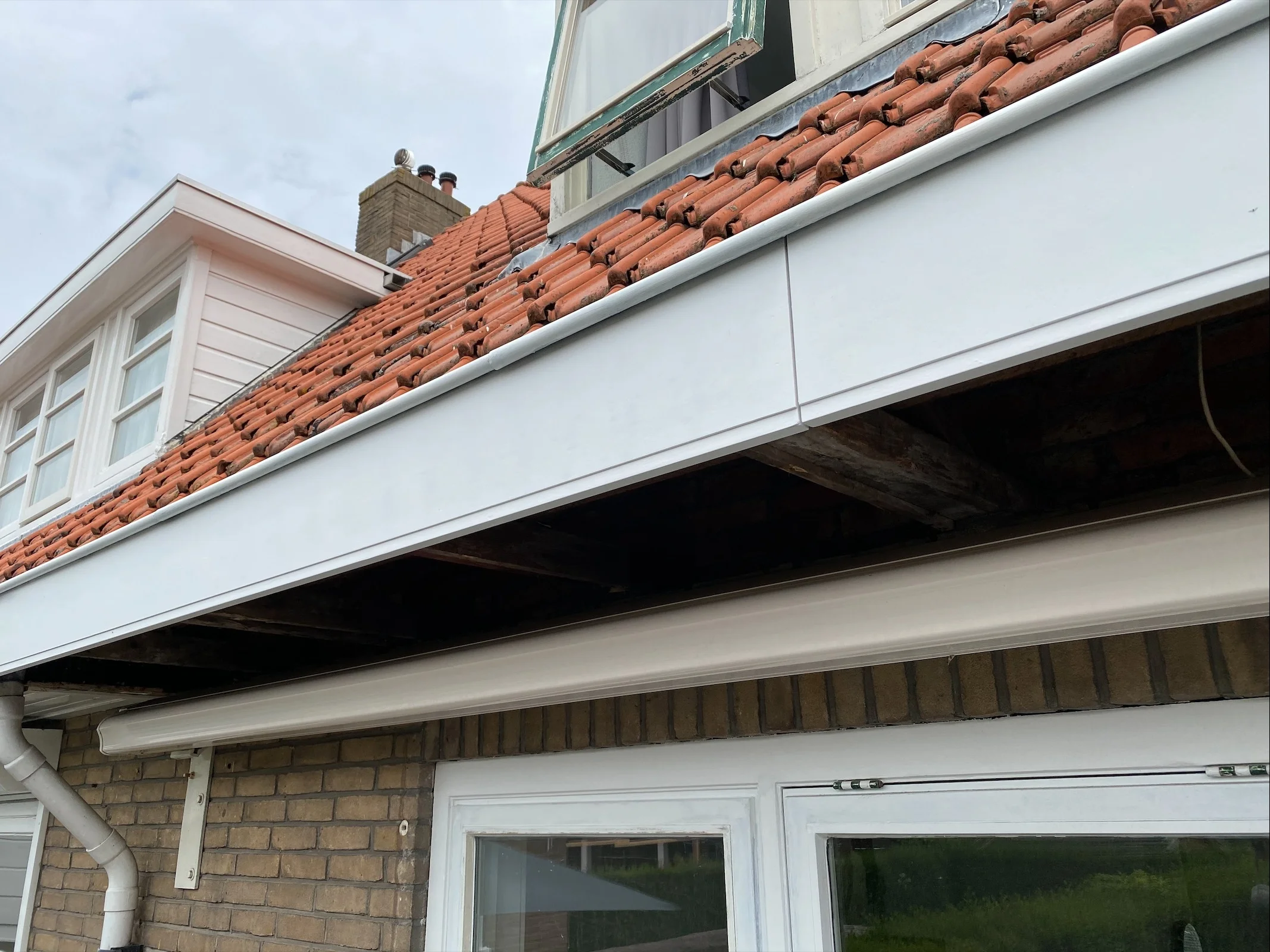 Renouveler la façade du garage avec du contreplaqué | TOSIZE.fr